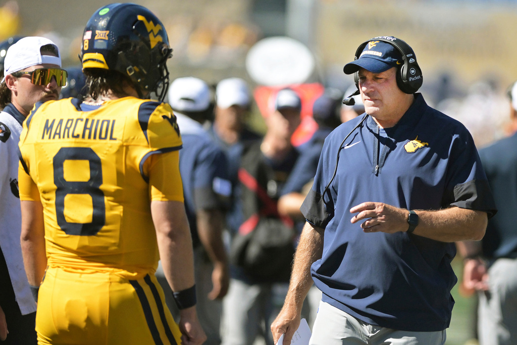 WVU’s quarterback questioned answered: Nicco Marchiol shines as starter ...